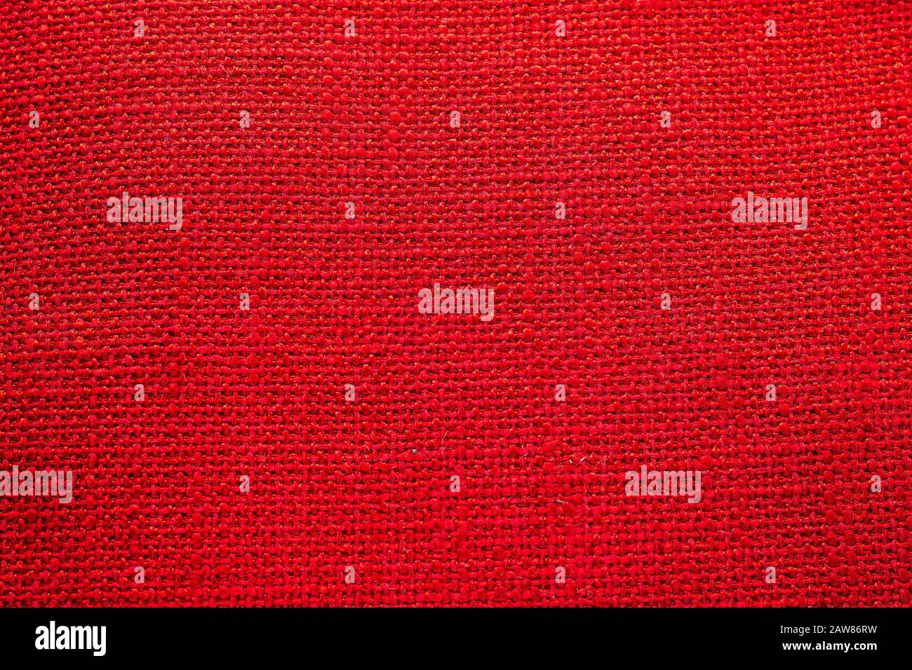 Rustic canvas fabric texture in red woven color Stock Photo - Alamy
