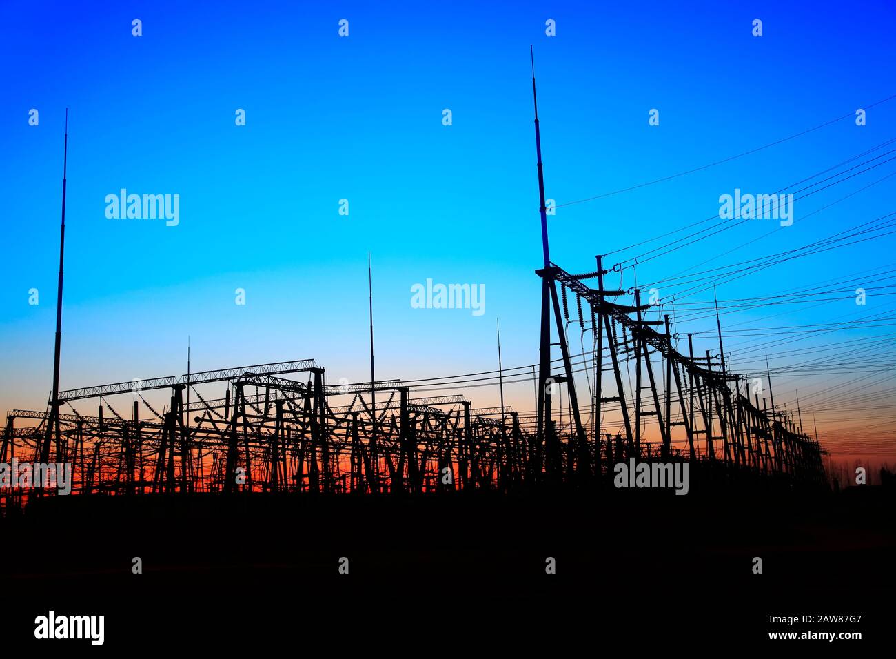 The power supply facilities of contour in the evening Stock Photo - Alamy