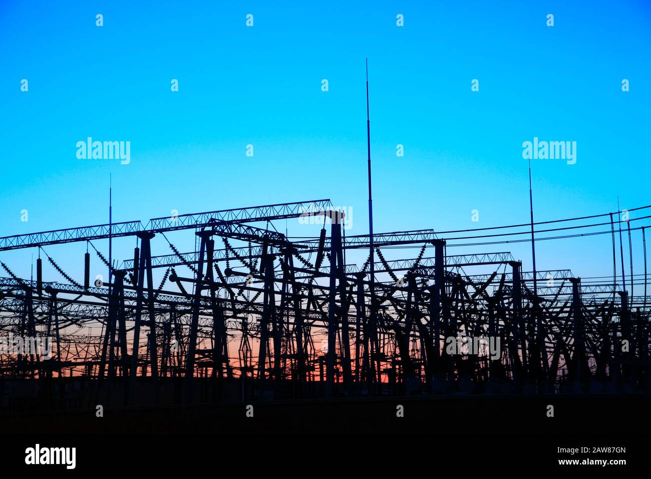 The power supply facilities of contour in the evening Stock Photo - Alamy