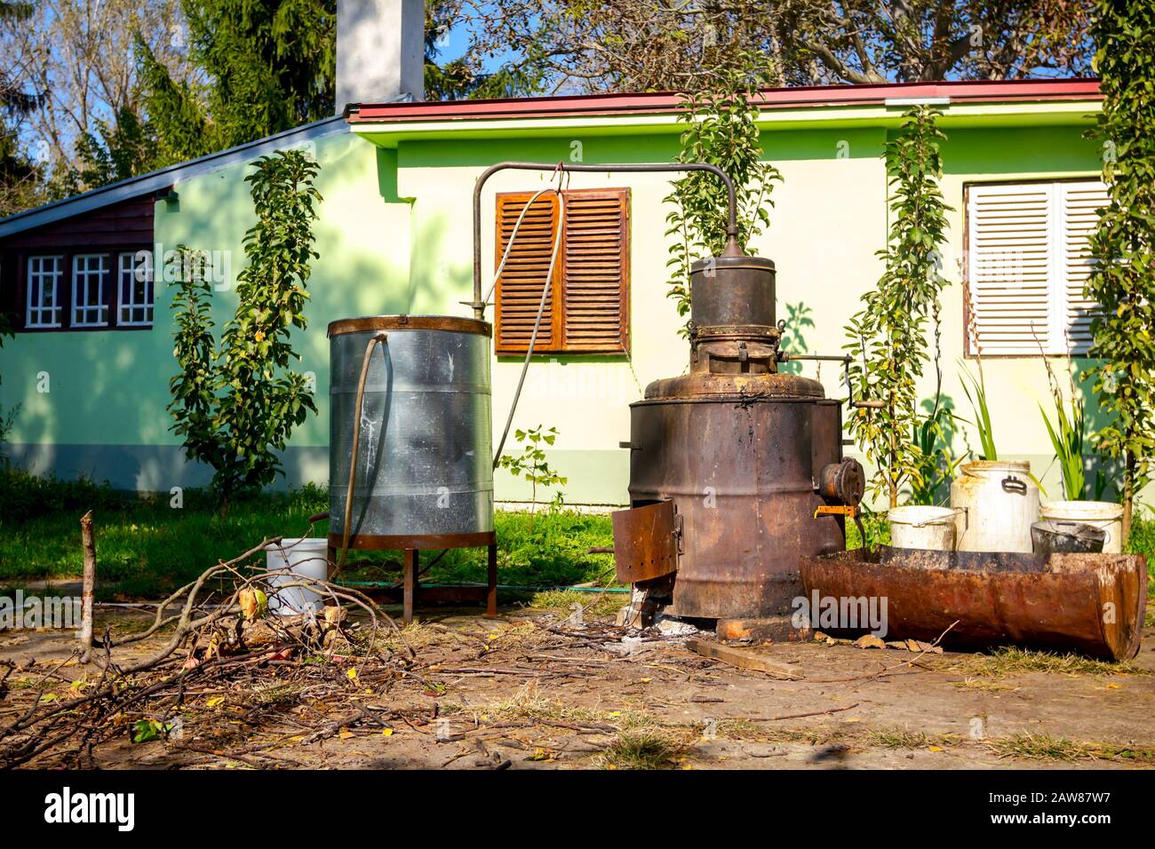 Domestic production with homemade distillery made of copper, making ...