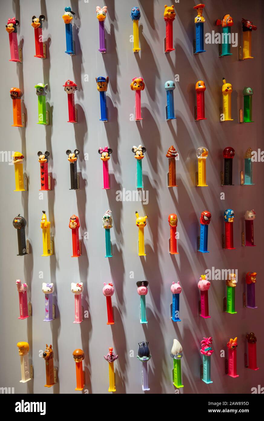 COLOGNE, February 2020: Many PEZ dispenser characters on display at ISM ...