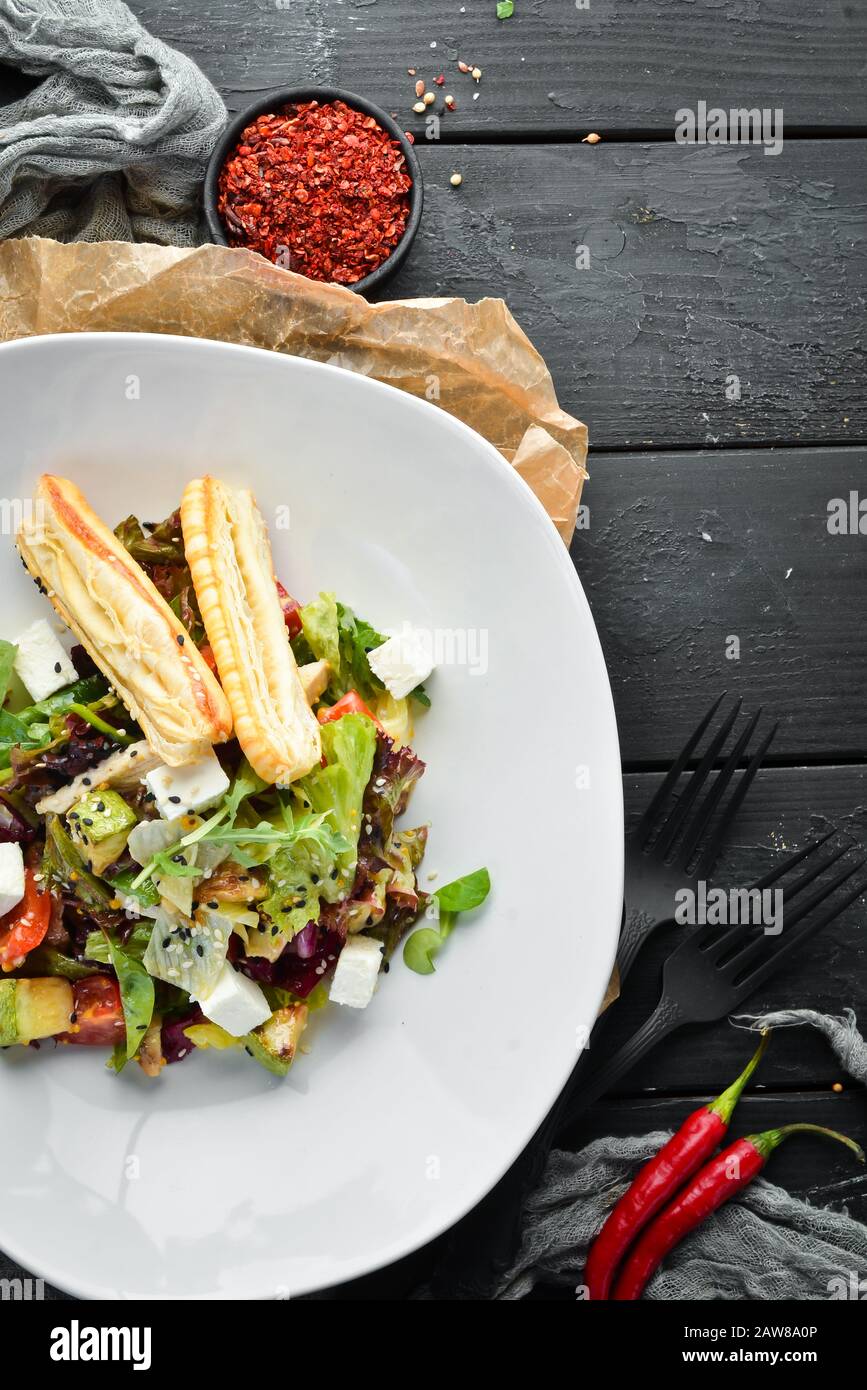 Vegetable salad with feta cheese. Food. Top view. Free space for your ...