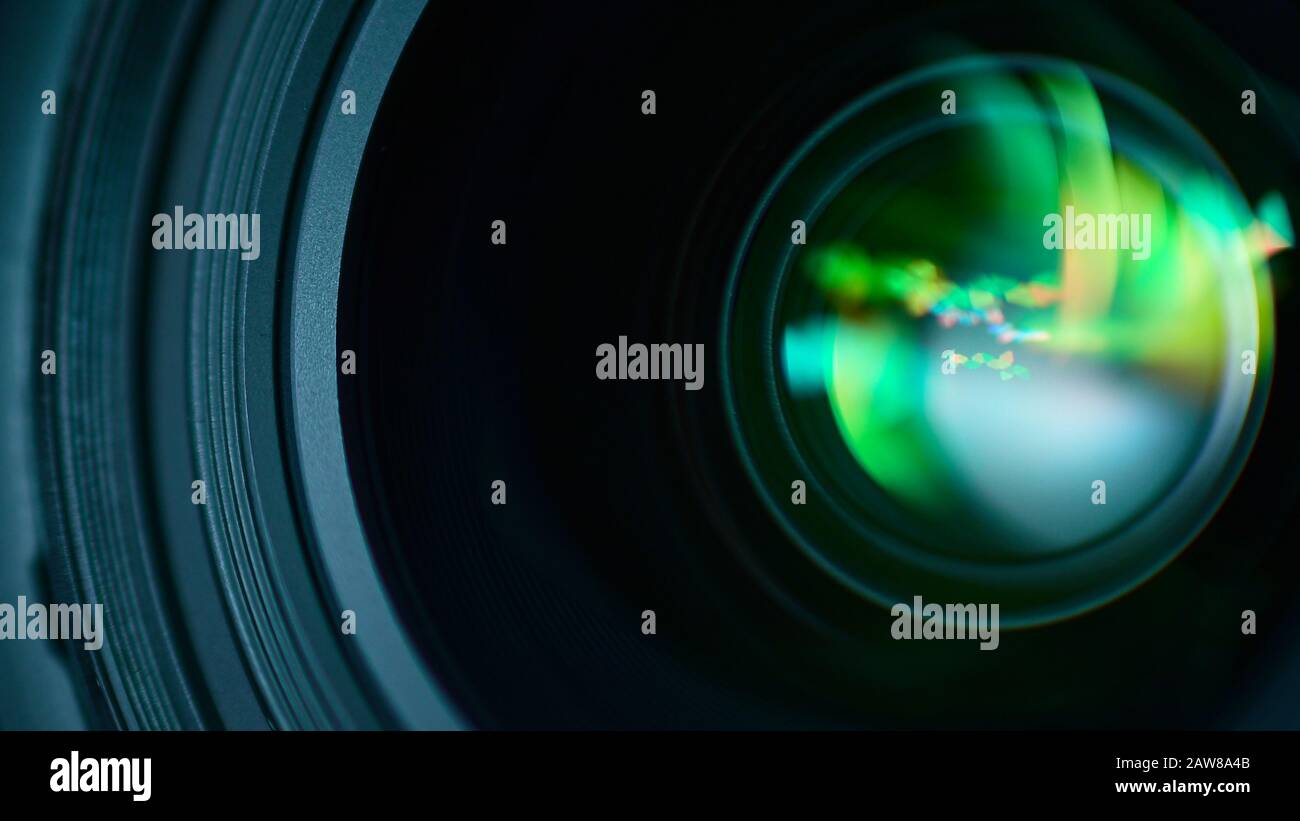 Macro photography of a DSLR lens with a colorful glare Stock Photo - Alamy