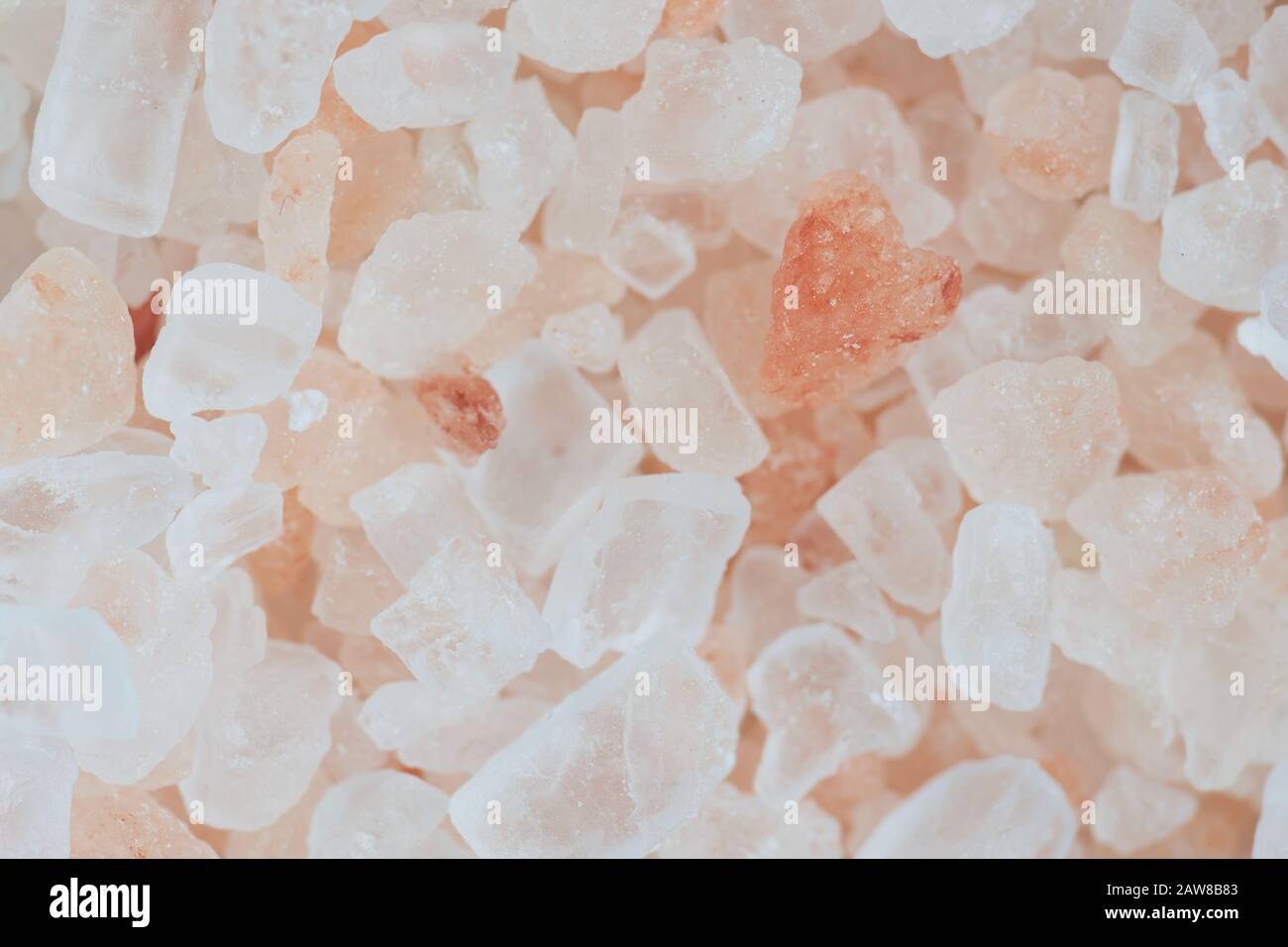 Macro photography of shiny Himalaya salt gems with a heart shaped salt ...