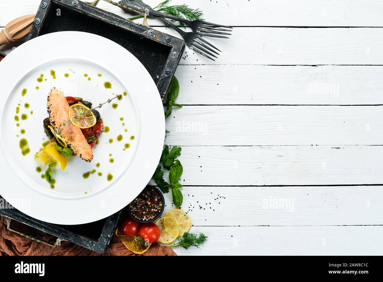 Baked salmon fillet with sesame and vegetables. Dishes, food. Top view ...