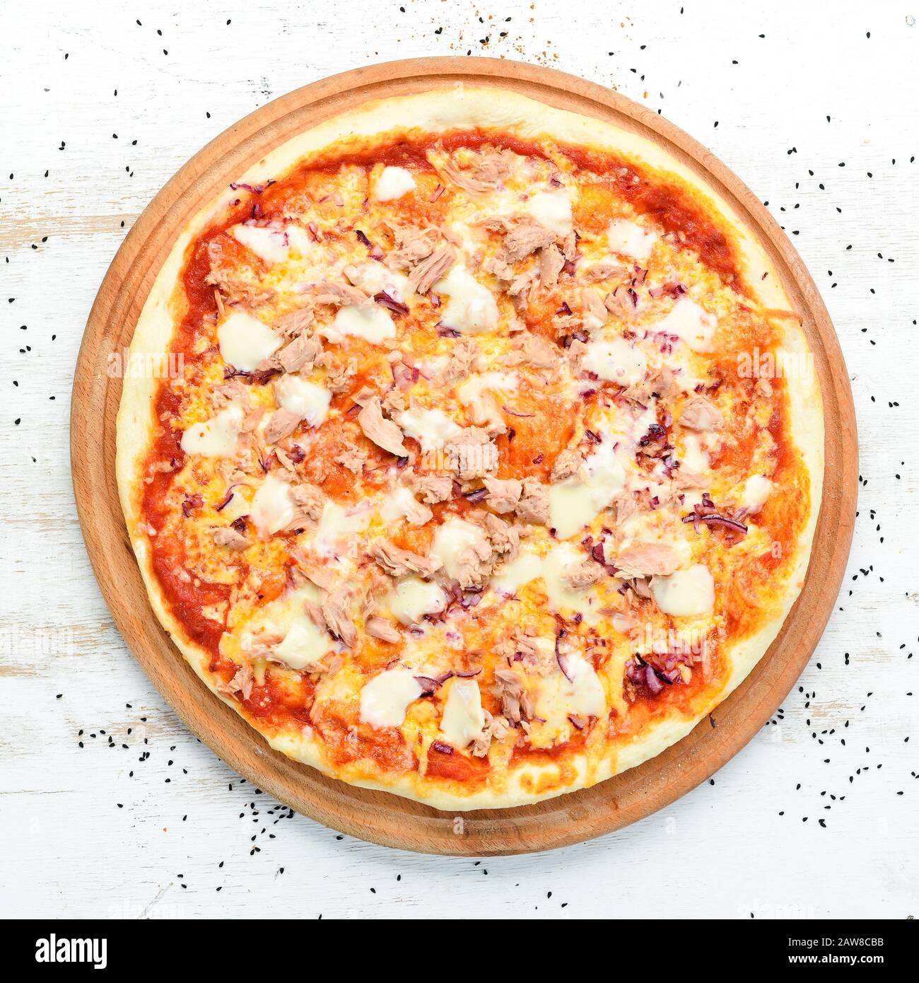 Traditional pizza with tuna and vegetables. Top view. free space for ...