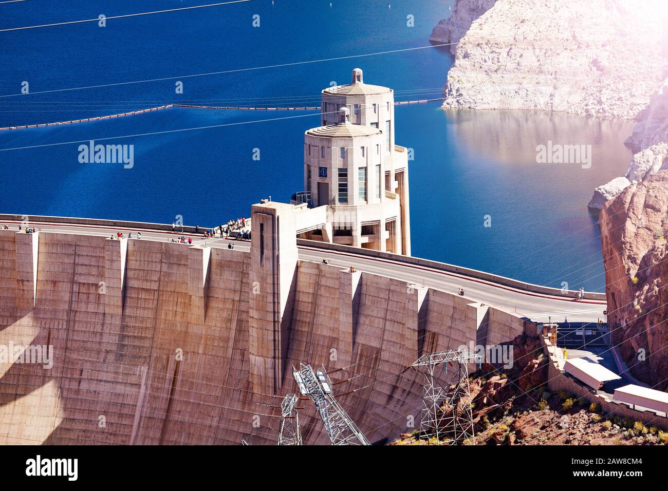 Tower on the concrete arch-gravity Hoover Dam in the Black Canyon of the Colorado river on ...