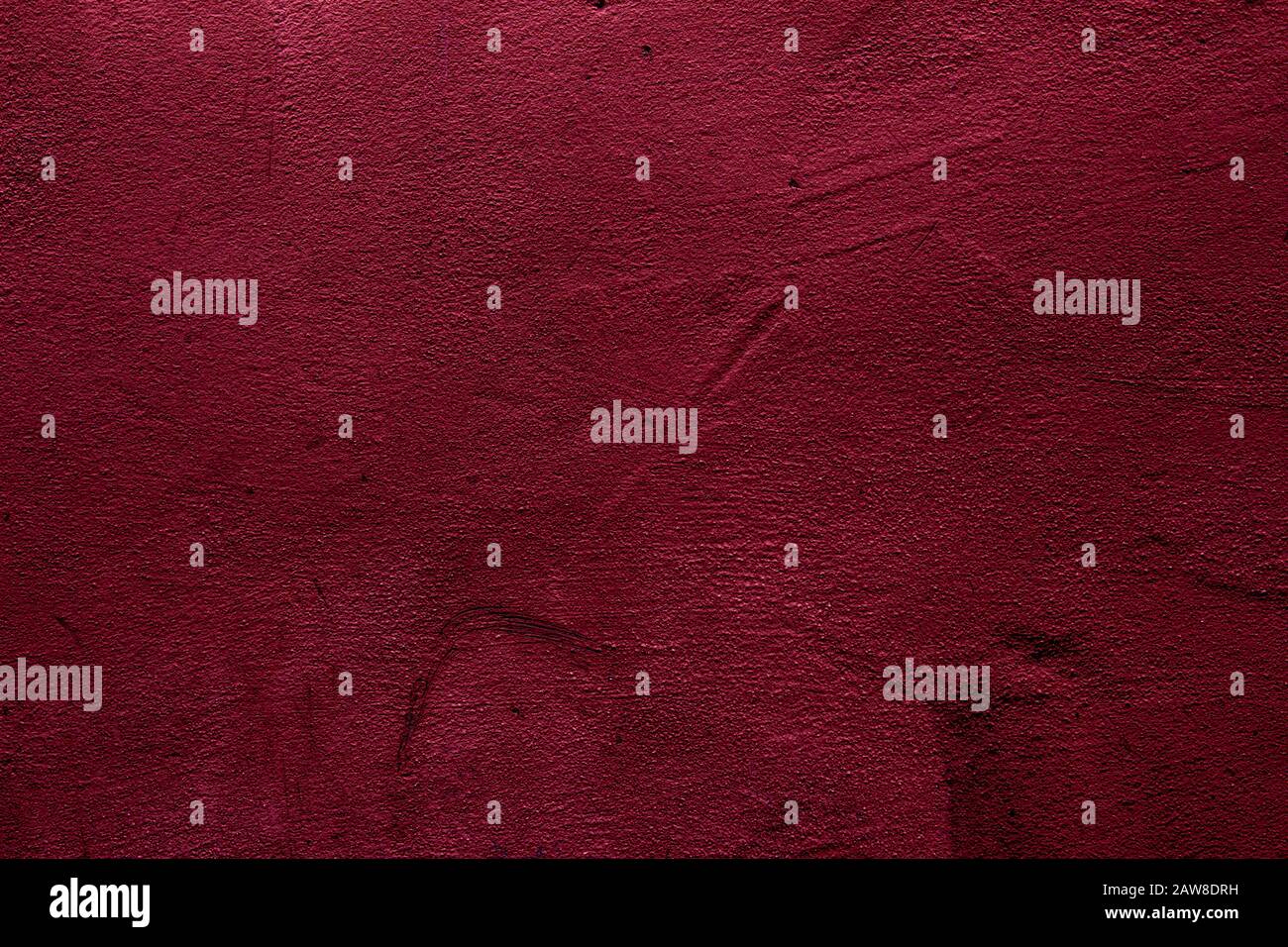 Crimson colored abstract wall background with textures of different ...
