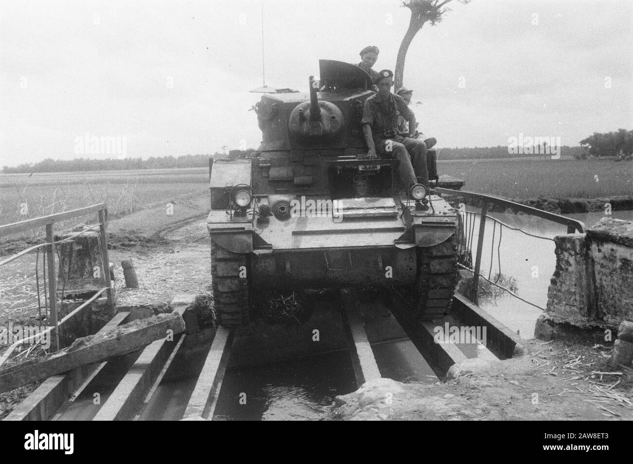 Action with tanks at Toba and surroundings M3 Stuart tank runs over a ... Action with tanks at Toba and surroundings M3 Stuart tank runs over a ...