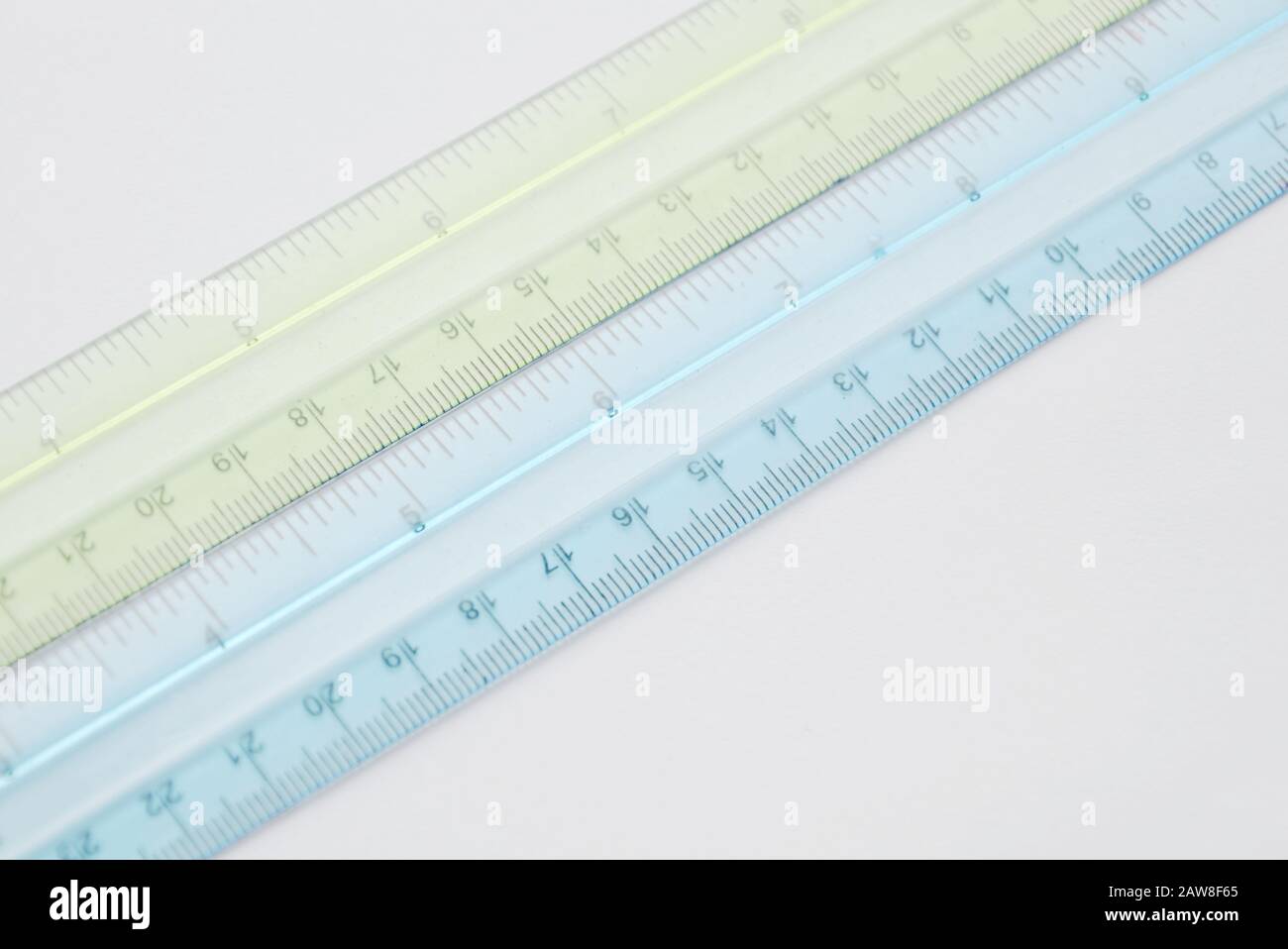 colorful plastic ruler on white background Stock Photo - Alamy