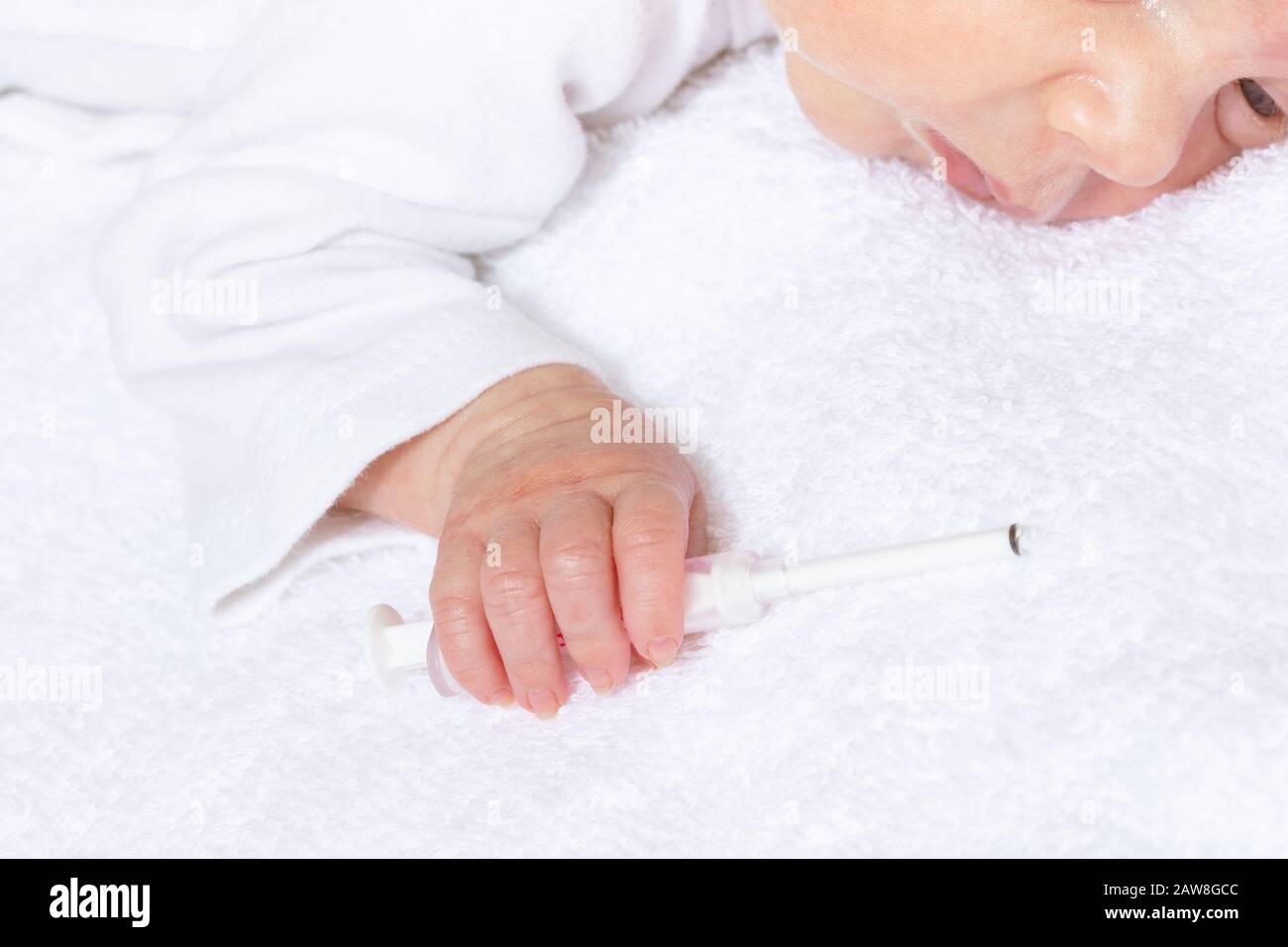 Little baby infant small hand with medical syringe - vaccination and ...