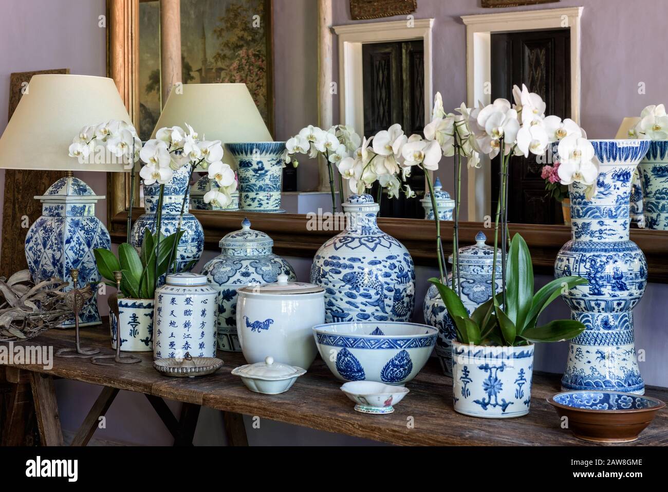 Ceramic collection with orchids Stock Photo - Alamy
