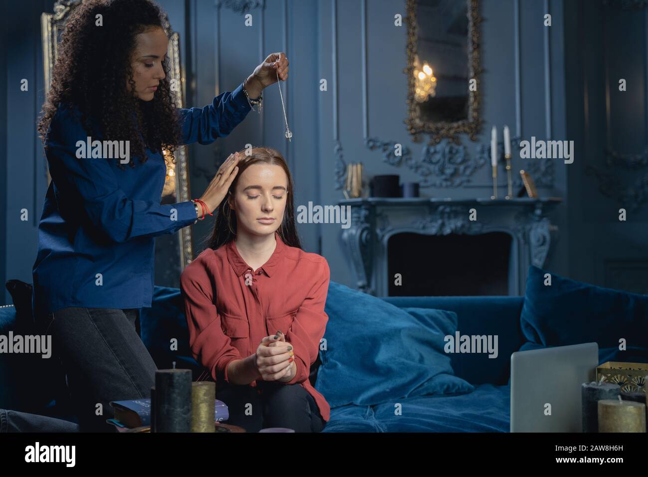 Spiritual healer working with a female patient Stock Photo - Alamy