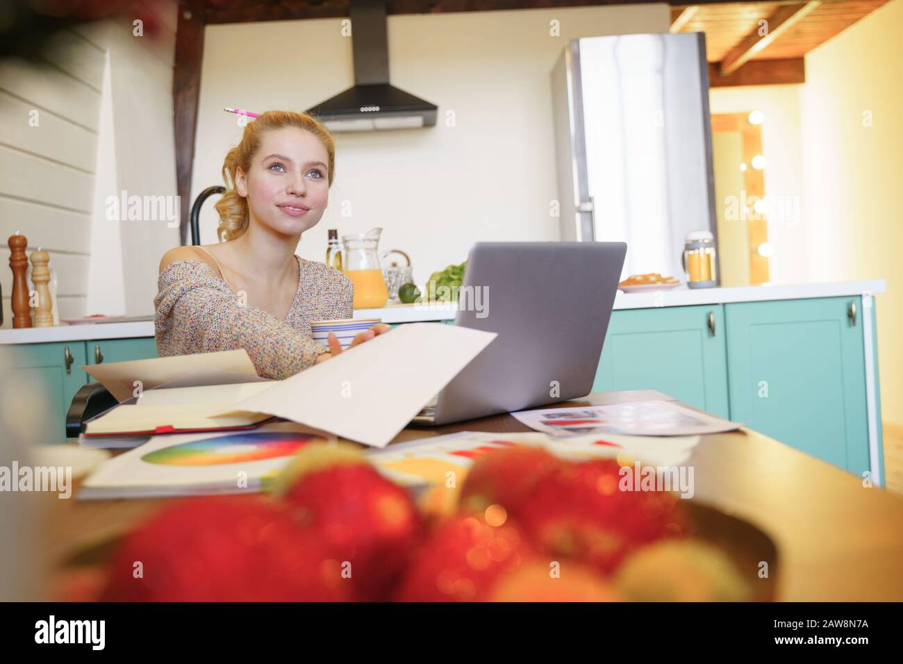 Positive delighted female person thinking about results Stock Photo - Alamy