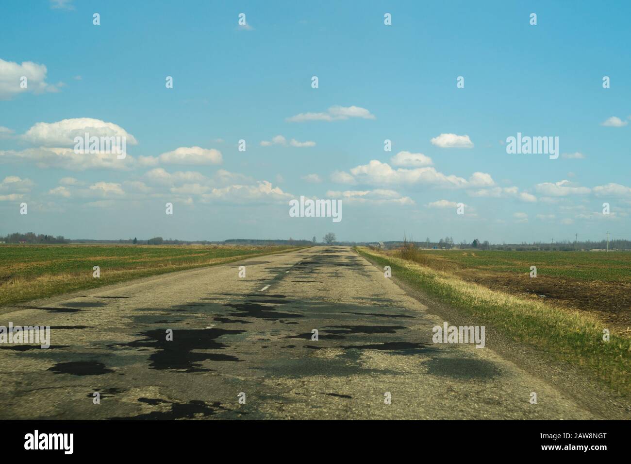 Roadway through the field. country road. nature landscape Stock Photo ...
