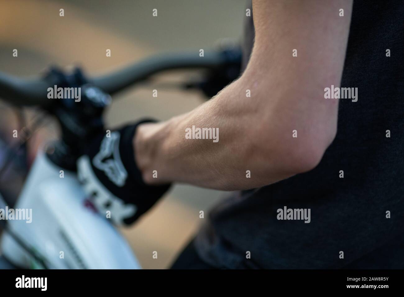 Mountainbike boy arm muscle close up biceps Stock Photo - Alamy