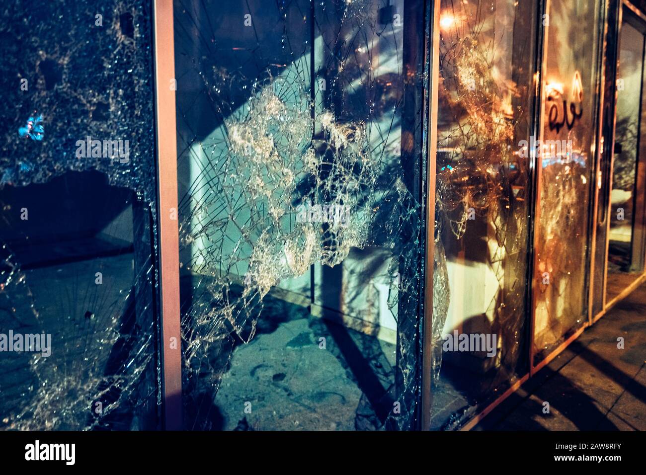 Photojournalism, broken shopfront, crime night scene, the background of ...