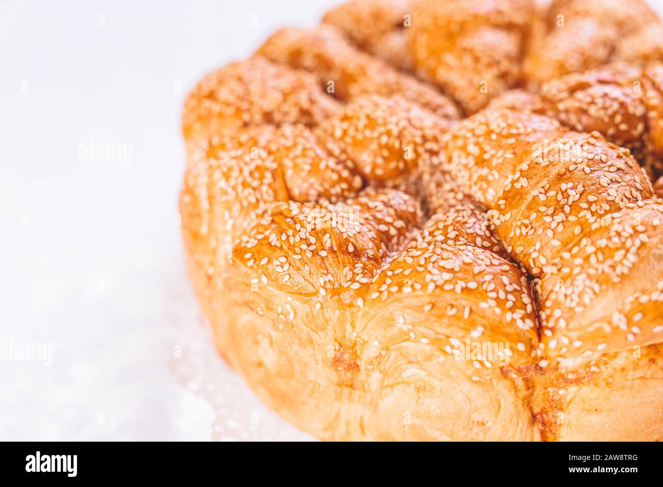 Traditional Serbian pogaca or cesnica bread covered with sesame seeds ...