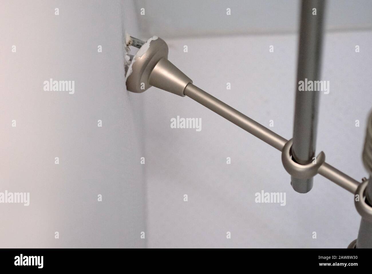 The curtain wall mount sags and falls. The metal cornice sagged down ...