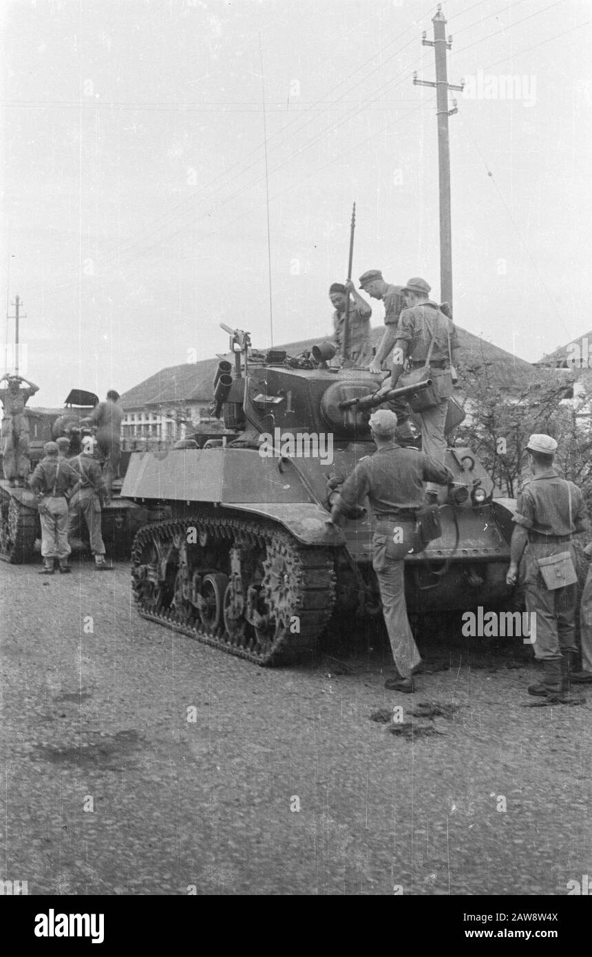 [soldiers mount a Stuart tank] Date: April 1947 Location: Indonesia ...