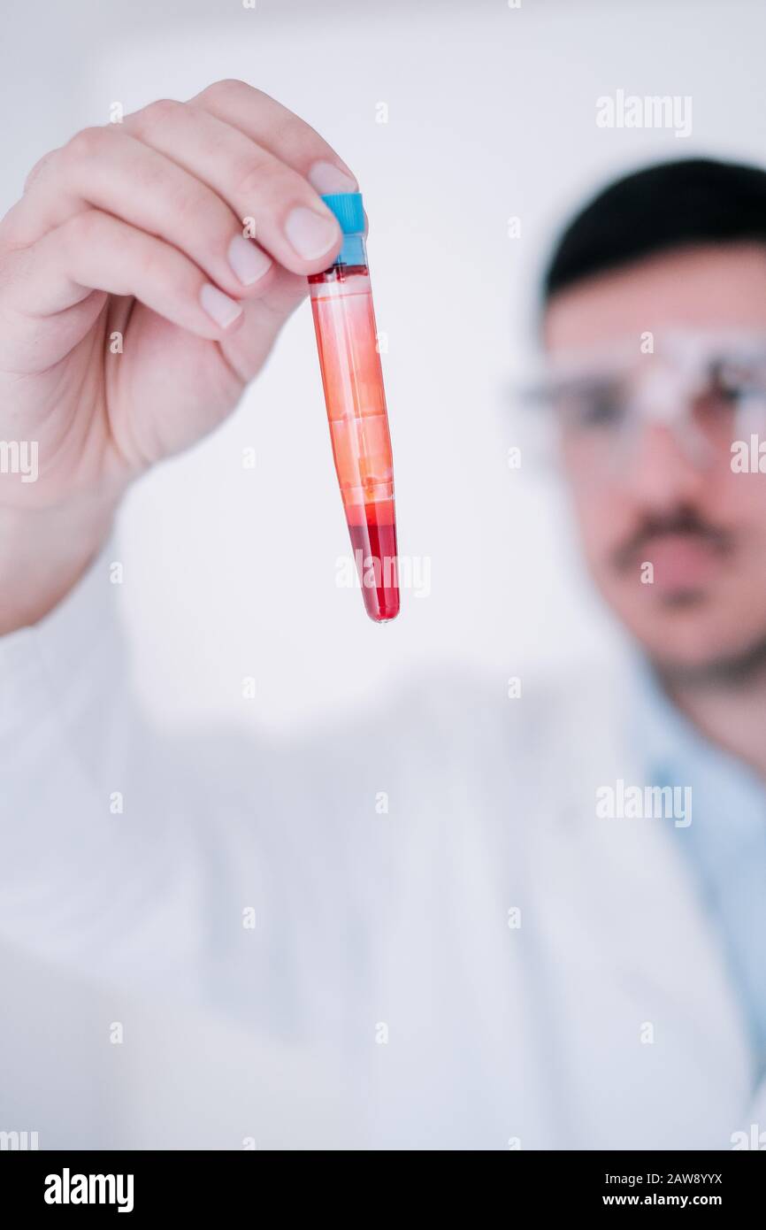 Doctor laboratory tubes hi-res stock photography and images - Alamy