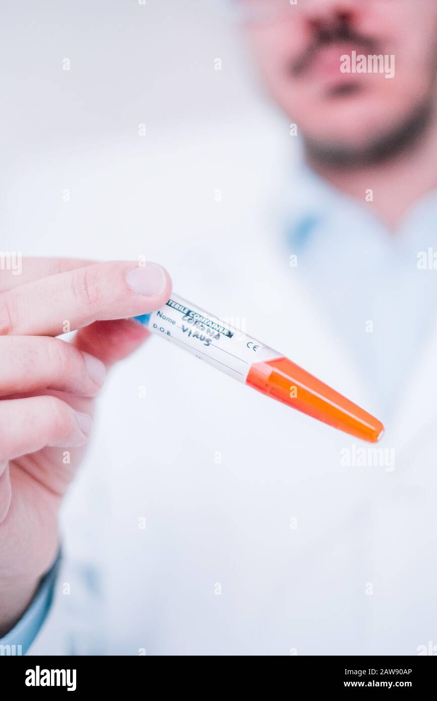 A doctor doing medical research in a lab with test tubes Stock Photo ...