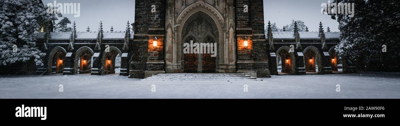 Castle at night in the snow with lights shining Stock Photo - Alamy