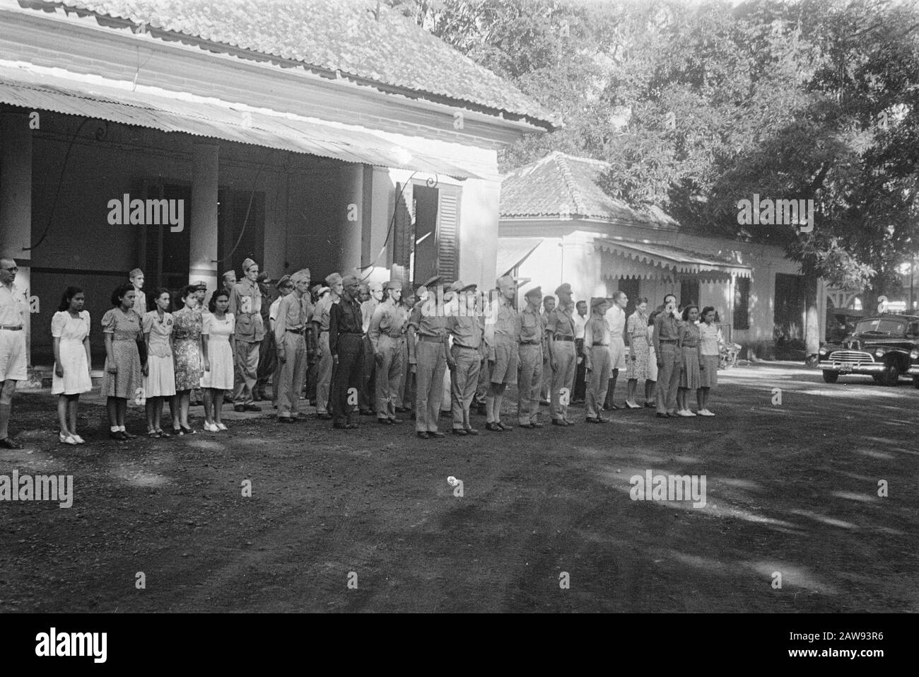 Ceremony (foreign grant award?) .. Soldiers stand to attention in front ...