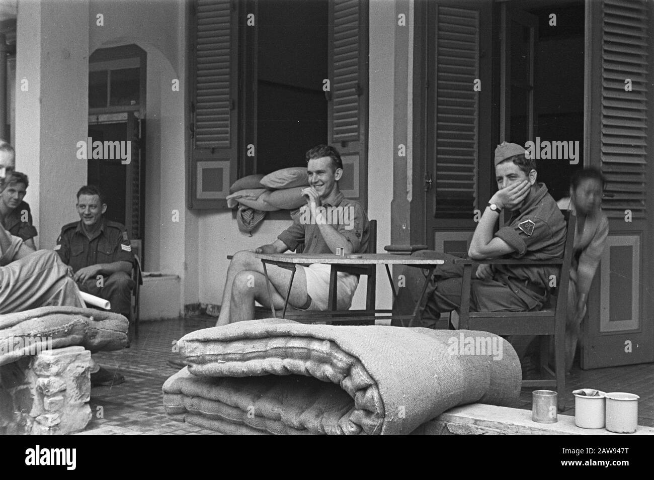 Relaxation Refuge Resting Warrior Bandung. Soldiers sit on a porch Date ...