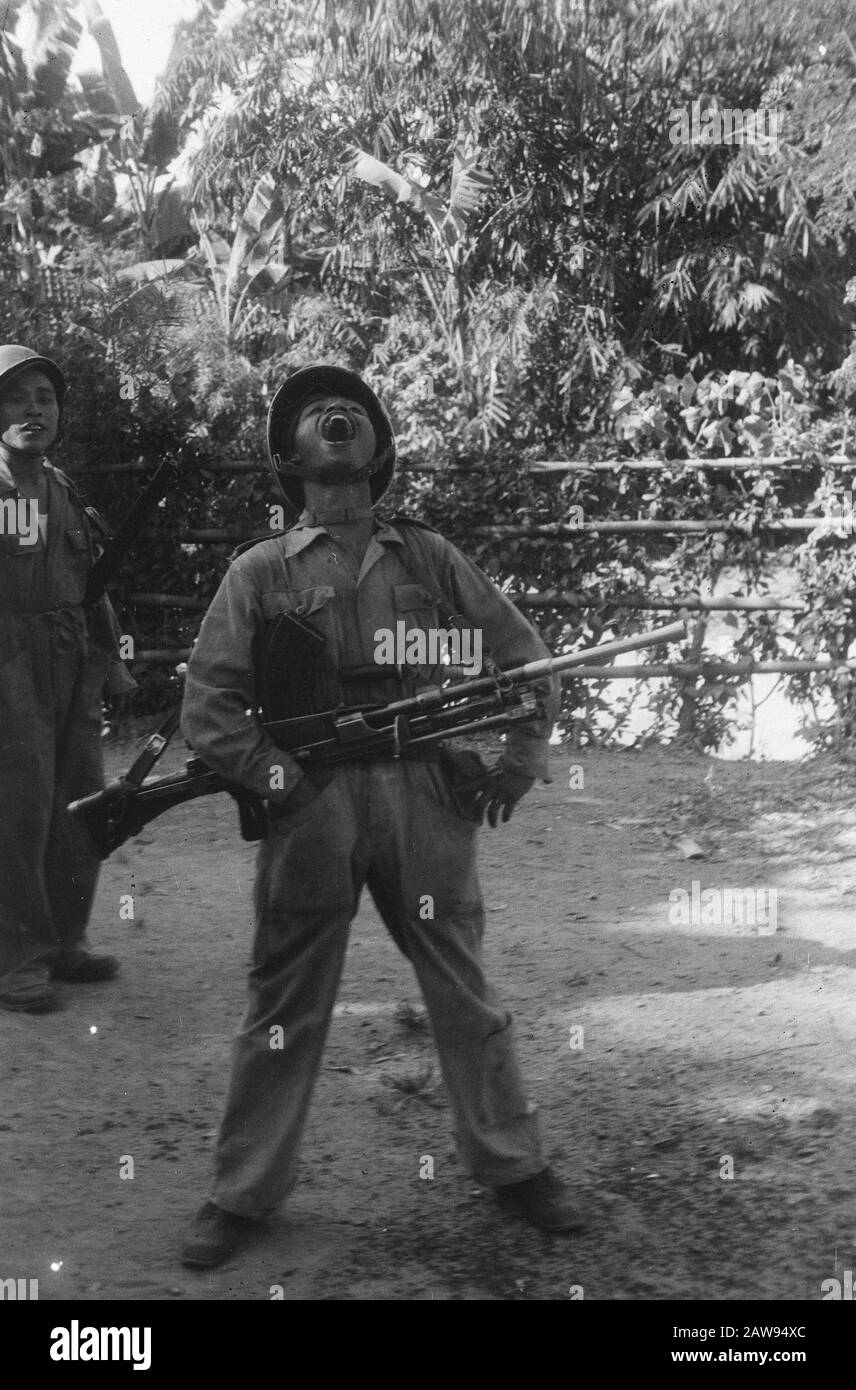 KNIL soldier with Bren gun with mouth opened up Annotation: DJK Date ...