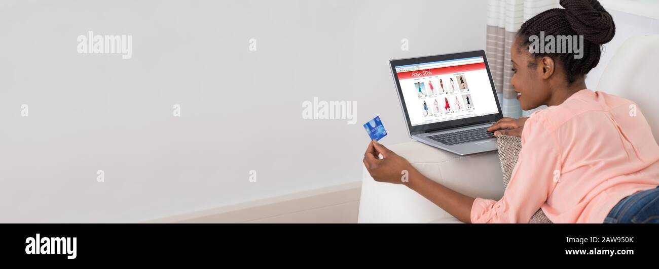 Barefoot girl laptop hi-res stock photography and images - Alamy