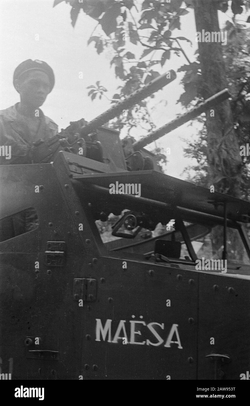 KNIL miltair behind double machine gun on an armored Date: 01/01/1947 ...