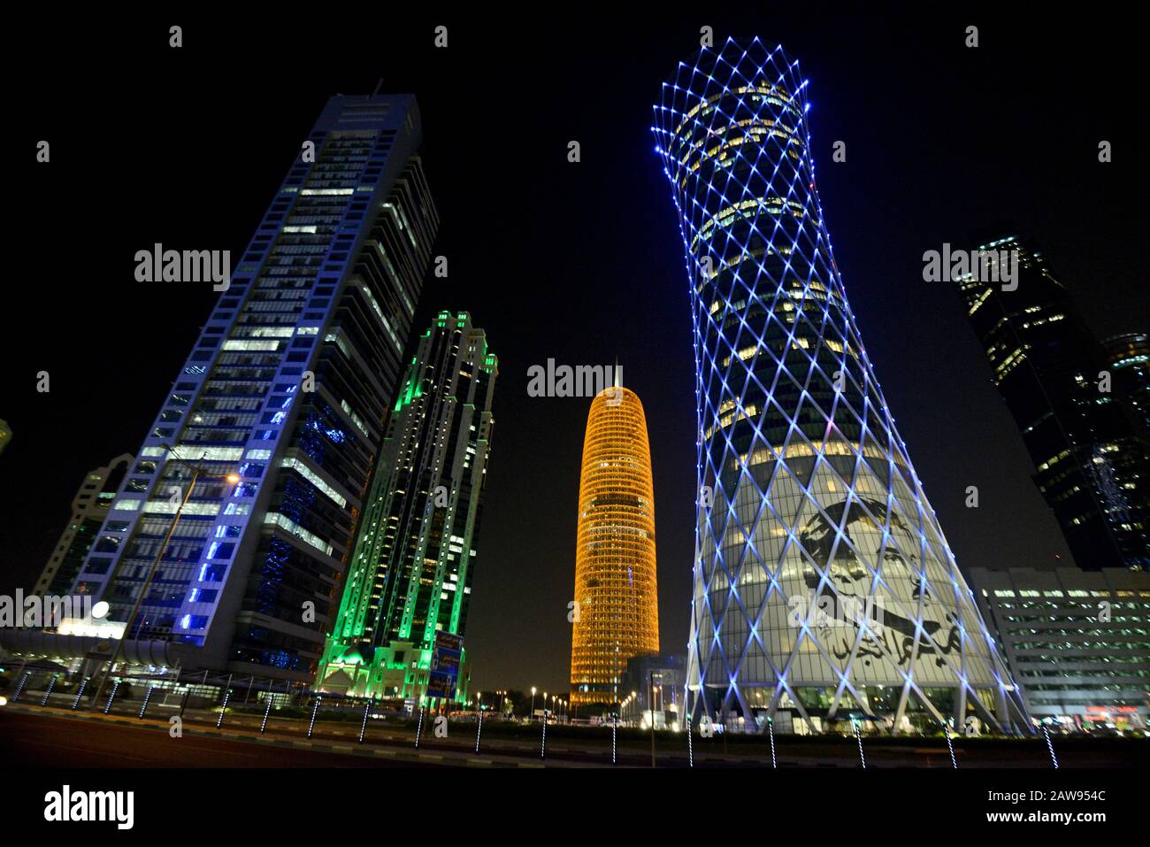 Doha West Bay district skyscrapers by night, Qatar Stock Photo - Alamy