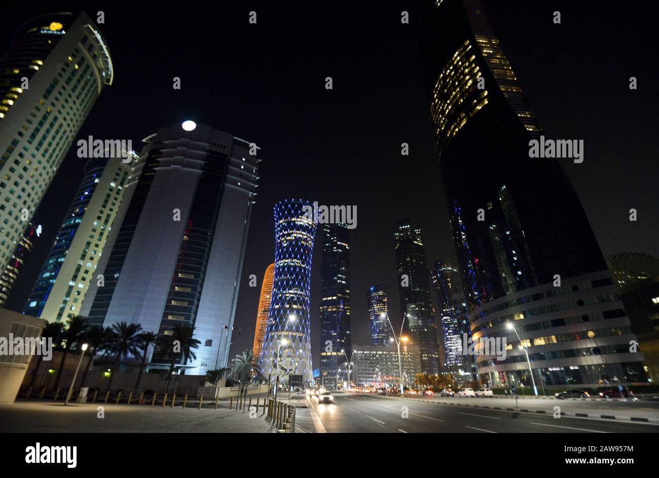 Doha West Bay district skyscrapers by night, Qatar Stock Photo - Alamy