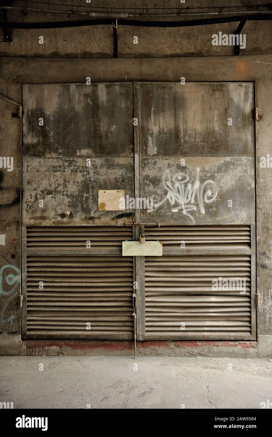 Ancient technical transformer room with metallic closed door Stock ...