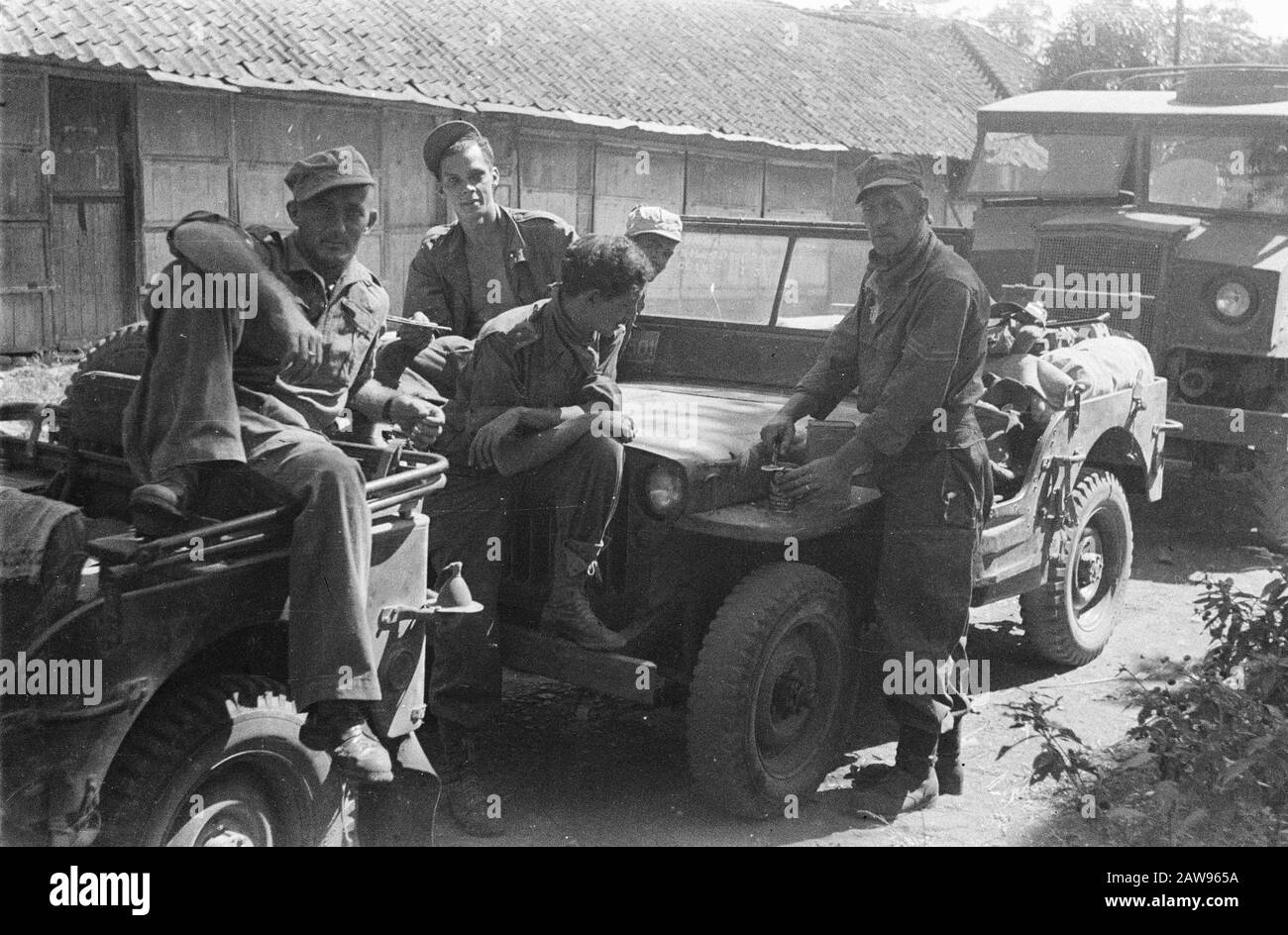 Soldiers in army jeeps Black and White Stock Photos & Images - Alamy
