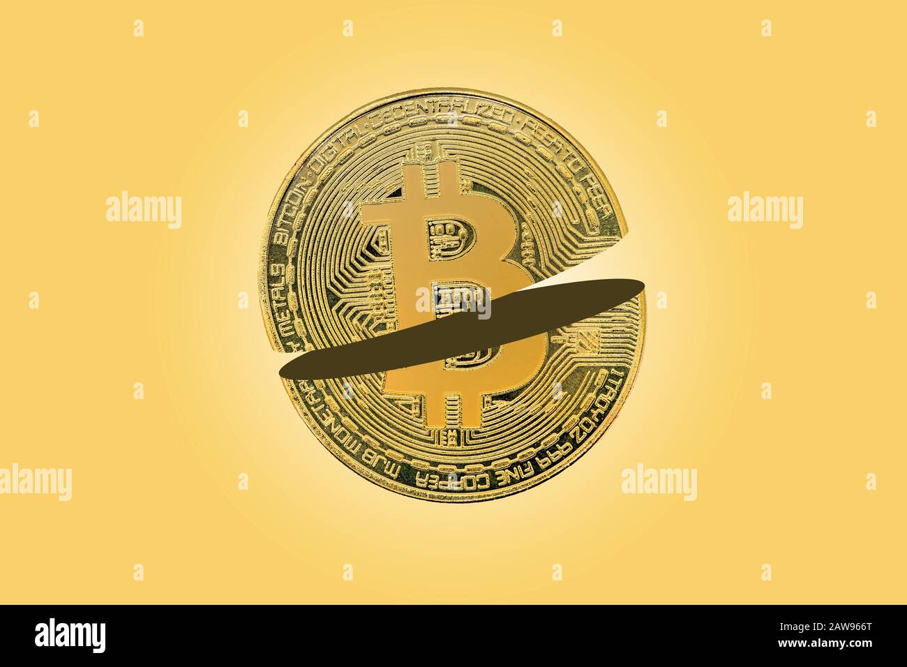 Bitcoin halving concept, block reward in half. Bitcoin coin cut into ...