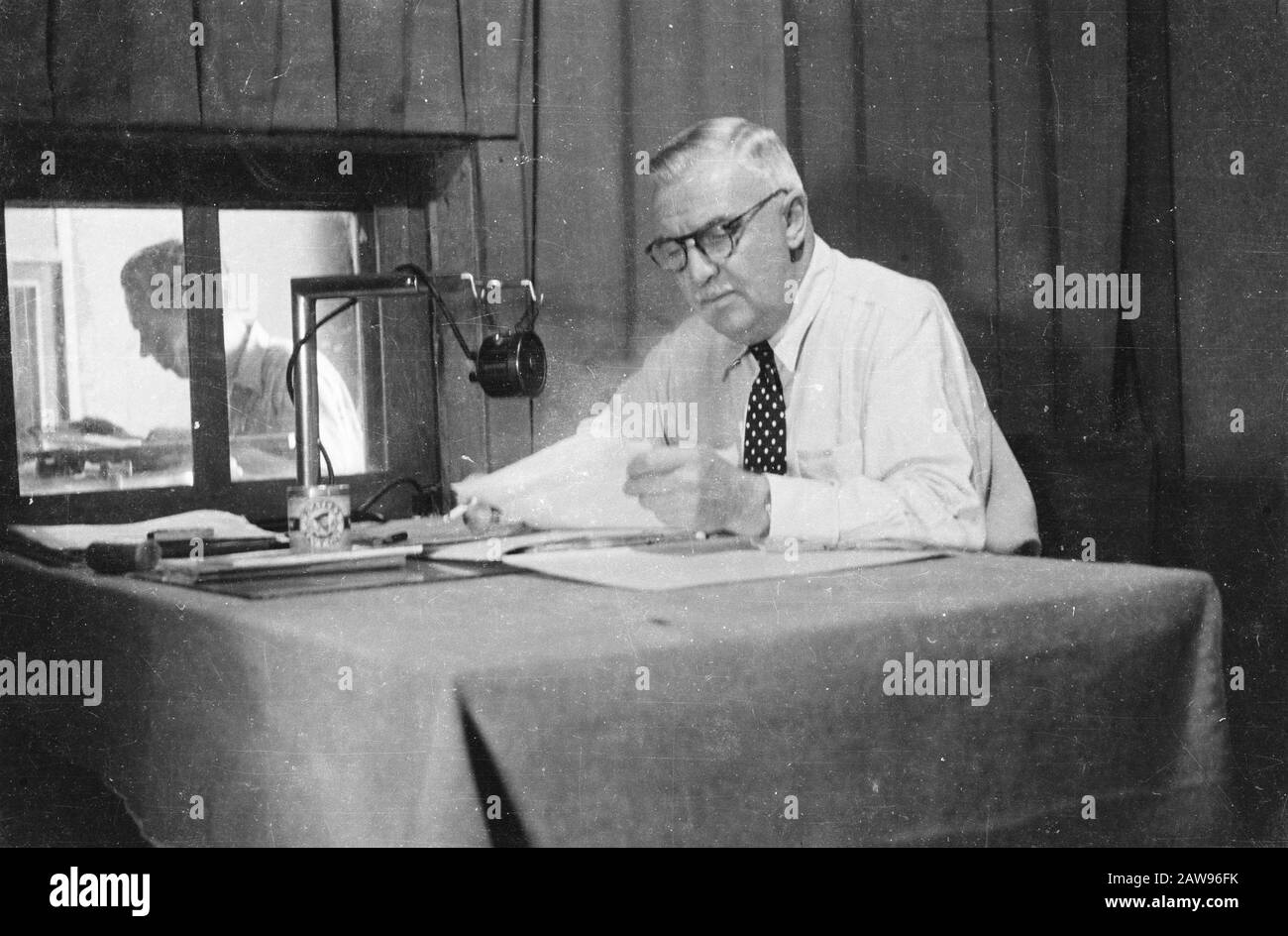 Radio Studio. Newscaster Date: 01/01/1947 Location: Indonesia Dutch ...