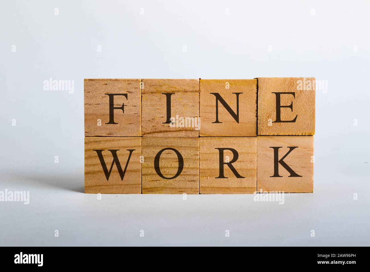 Wooden cubes with lettering spelling Fine Work. Business concept Stock ...