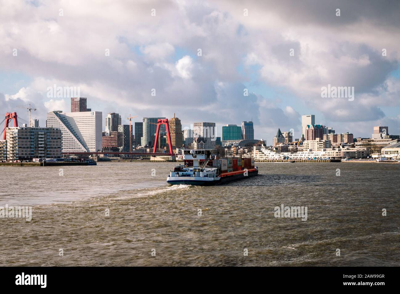 Cityscape in Rotterdam, beautiful clouds and sun in the sky, modern ...