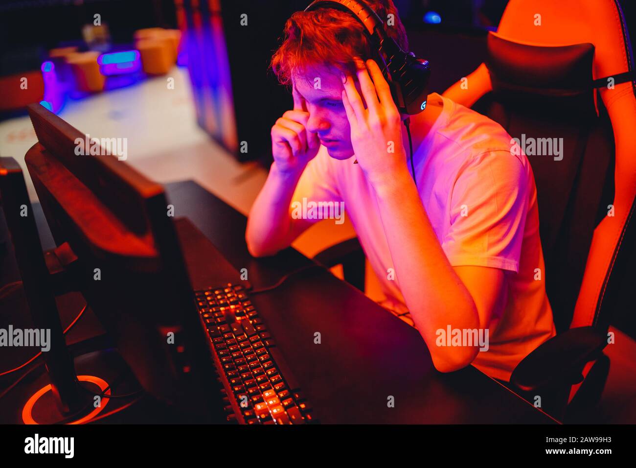 Gamer young man is defeated in online video game, anger and facepalm ...