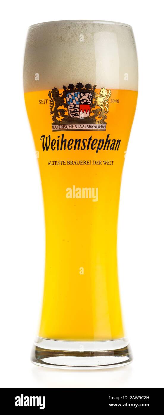 Glass of german Weihenstephaner wheat beer isolated on a white ...