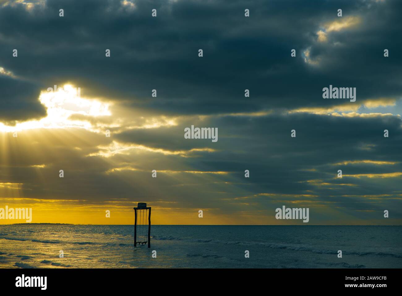 Holbox island sunset beach palm tree tropical in Mexico Stock Photo - Alamy