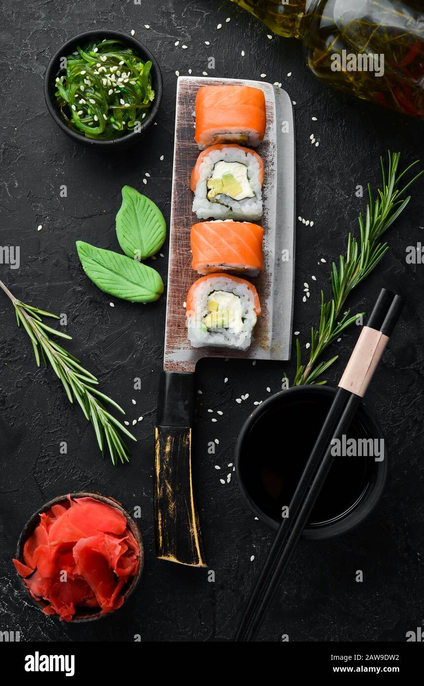 Philadelphia sushi roll with salmon and avocado. Japanese Traditional ...