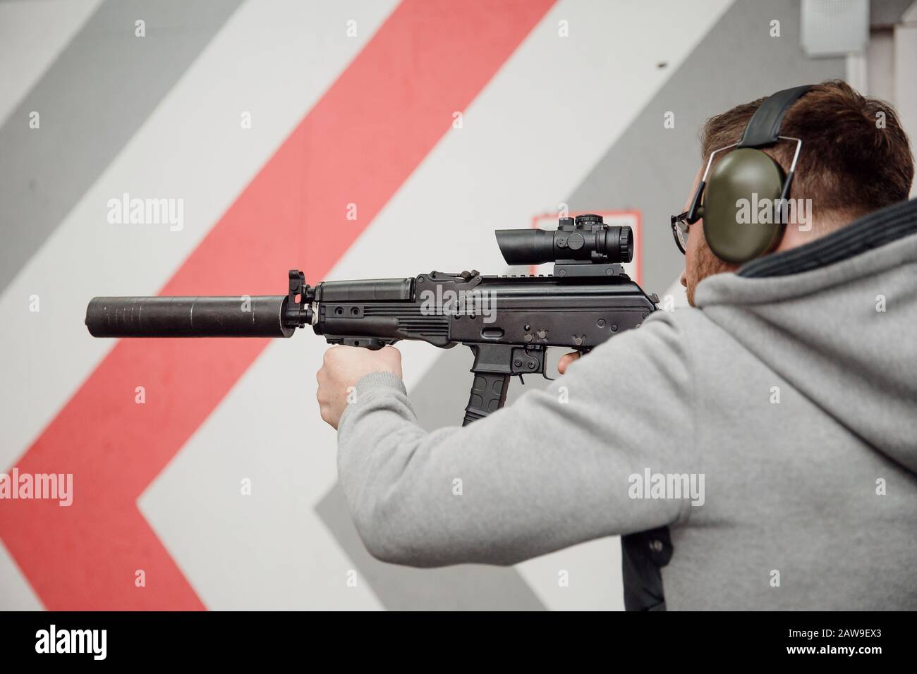 Automatic weapons aim firing gun pistol man with loading cartridges ...