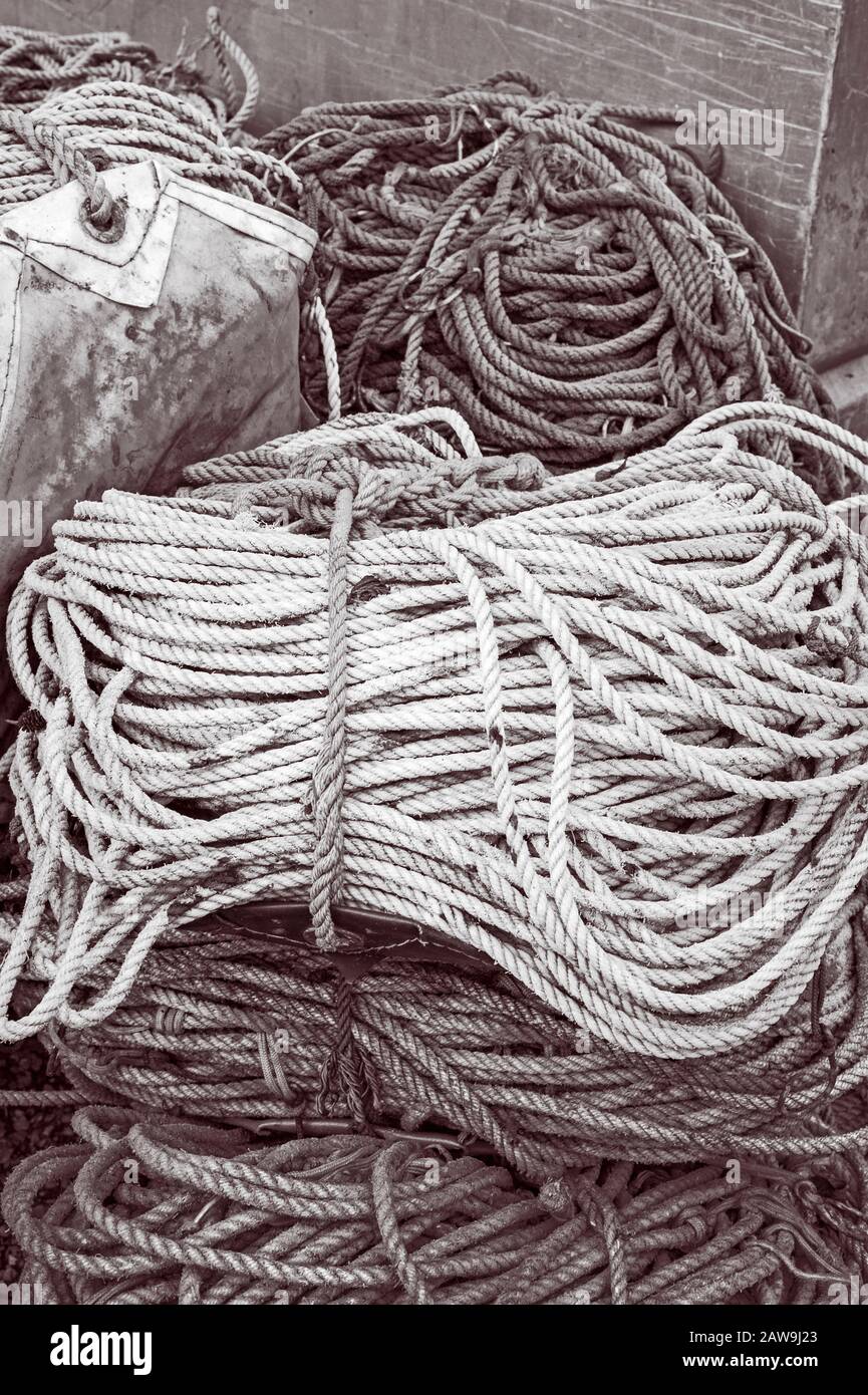 Spooled up and stowed rope and twisted nylon line, used for commercial ...