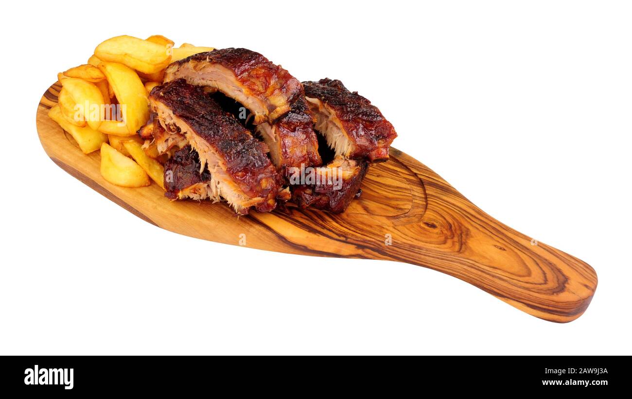 Barbecued pork ribs meal with chips isolated on a white background ...