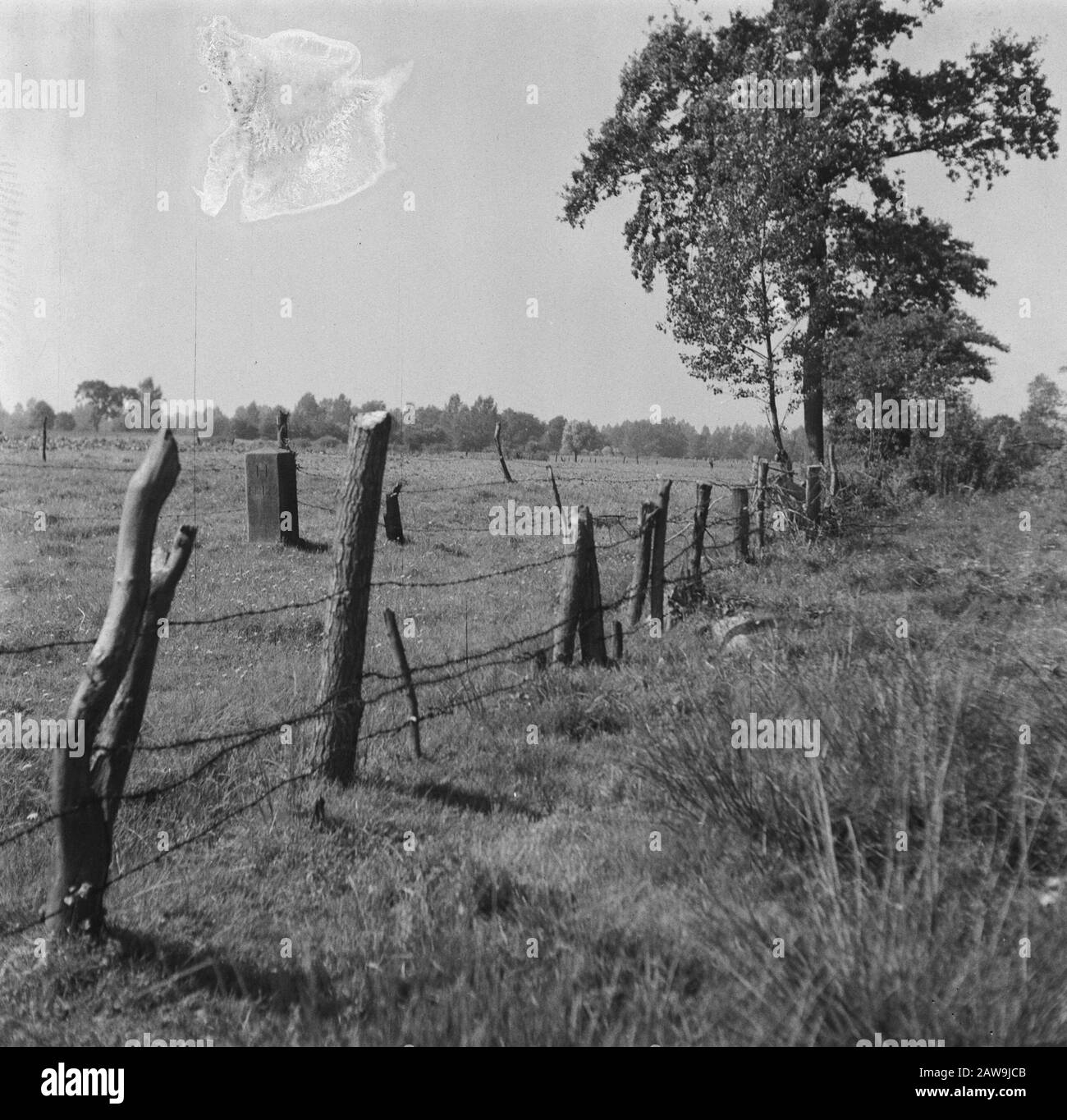 Landmines holds at Vierlingsbeek description: Landscape with barbed ...