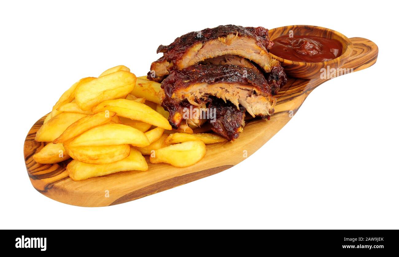 Barbecued pork ribs meal with chips and barbecue sauce dip isolated on ...