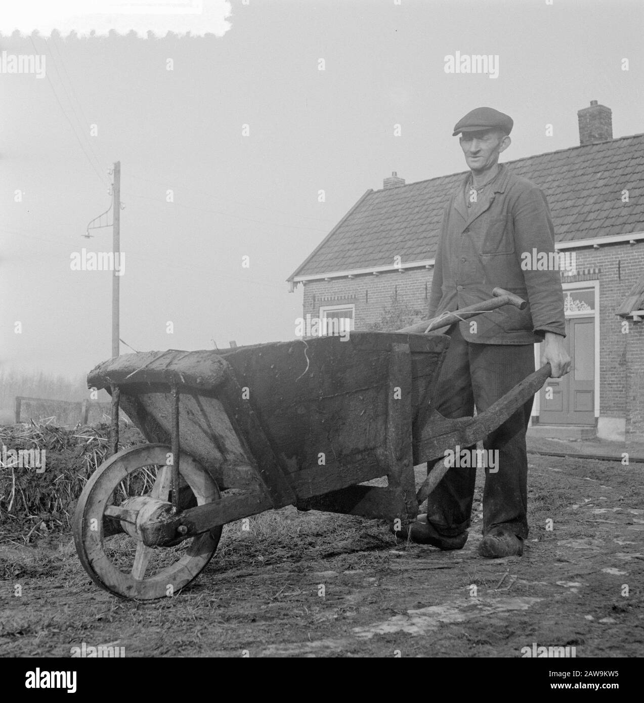 Farmhands Black and White Stock Photos & Images - Alamy